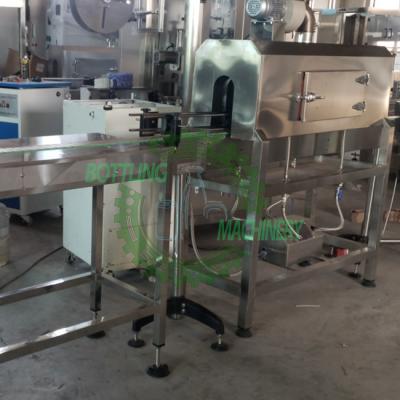 Cina Etichettatrice della bottiglia Semi-automatica della manica del tunnel di calore degli strizzacervelli dei 1,2 tester in vendita