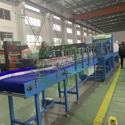 Cina Tipo lineare automatico macchina avvolgitrice della bottiglia di acqua del pacchetto di film 500ml 1L 2L in vendita