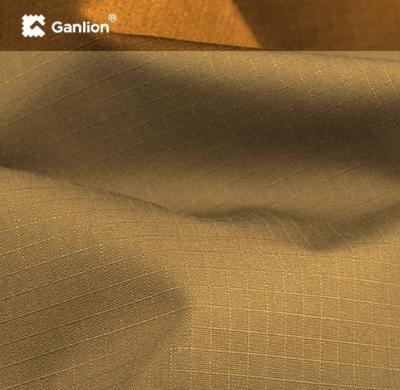 Cina Il cotone cachi scuro del poliestere ha riciclato il tessuto Ripstop 3*3 della fibra ecologico in vendita
