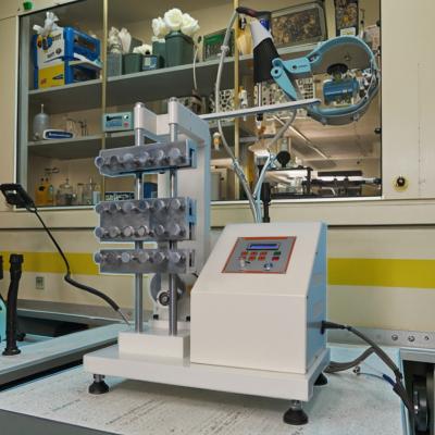 China Máquina de ensayo de torsión ASTM D813 D430 JIS K6301 ISO 132 Probador curvado de tejidos Equipo de ensayo de resistencia al plegamiento en venta