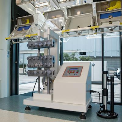 China Máquina de ensayo de torsión ASTM D813 D430 JIS K6301 ISO 132 Probador curvado de tejidos Equipo de ensayo de resistencia al plegamiento en venta