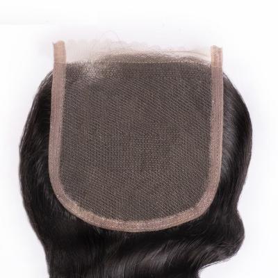 Chine Fermeture molle en soie lâche malaisienne de cheveux de cuticles d'extrémités de la fermeture 4X4 de vague pleine à vendre