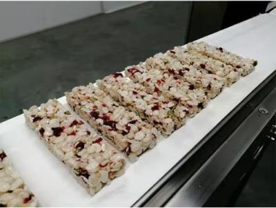 China SS304 Puffing rice / Cereal bar forming machine with buckwheat  nuts material for sale