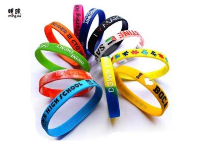 Cina OEM di gomma dei braccialetti del messaggio dei braccialetti su ordinazione del polso del silicone di colore di varietà in vendita