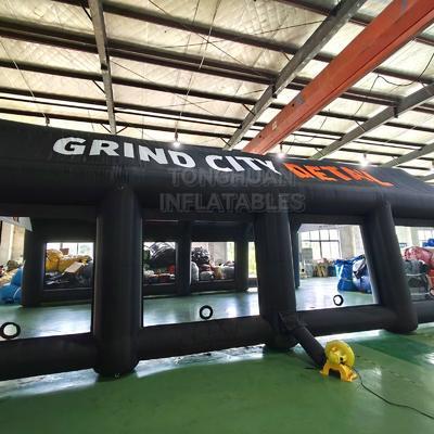 Commercial inflatable detailing tent side view with transparent windows and reinforced air columns