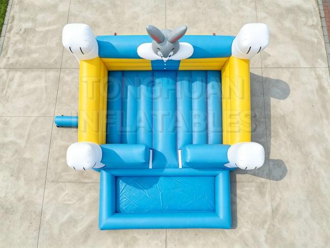· Inflatable bunny bounce house with mesh walls front step and soft jumping area for party rentals