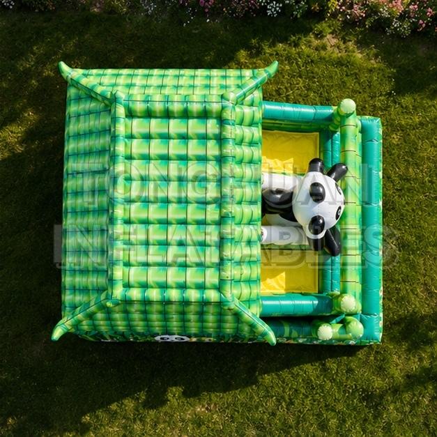 kids cartoon inflatable slide with panda artwork bamboo fence and nature theme
