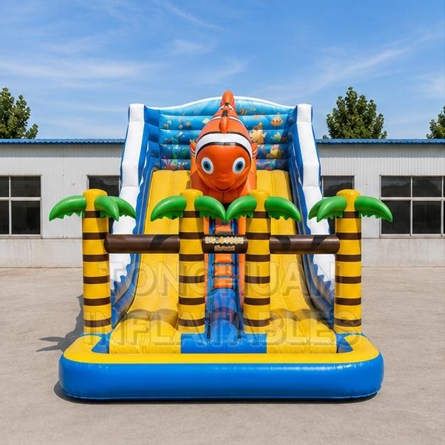 commercial inflatable pool water slide with splash pool and marine animal graphics