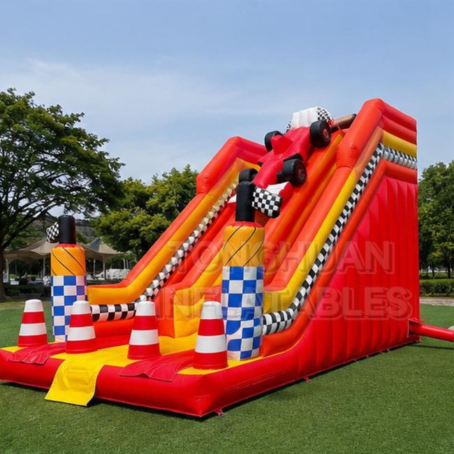 commercial motorsport inflatable slide with checkered flag decorations