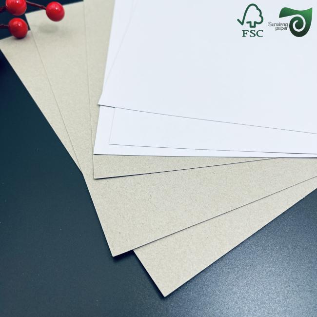 Recycled pulp duplex board roll and sheet format display