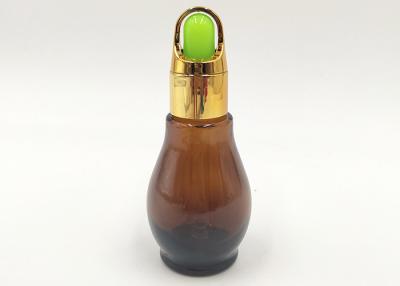 China garrafas cosméticas de vidro da cor 30ml ambarina com o tampão dourado para o óleo essencial à venda