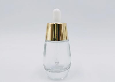China 1oz 30ml cancelam garrafas do conta-gotas, garrafas de vidro da loção douradas/tampão da prata à venda