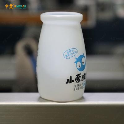 Cina Due macchine di serigrafia di Full Auto di colori per le bottiglie di acqua del latte in vendita