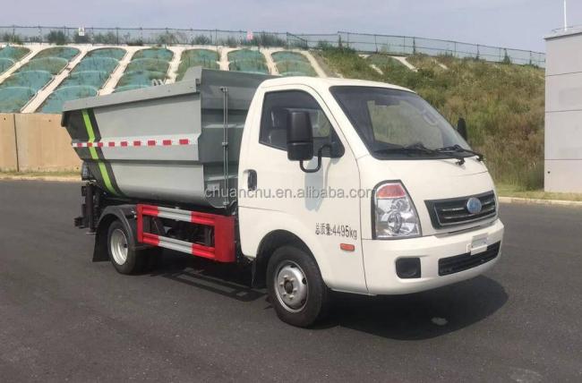 Pure electric self-loading garbage truck loading mechanism