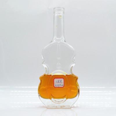 Cina Big Good 700ml 750g imballaggio in vetro trasparente per biberon di forma speciale in vendita