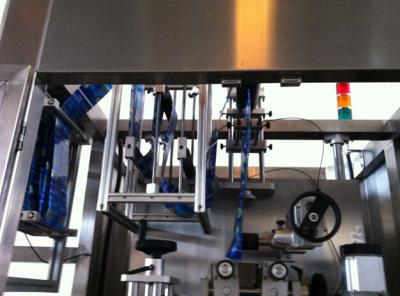 China Automatic Shrink Sleeve Labeling Machine For Small Bottle Water Cap Security Seal for sale
