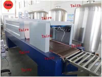 China Taire filling machine 10pcs/min automatic bottle shrink packing machine for sale