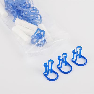 Cina SJ Factory Price Medical Grade Plastic Bracket Disposable Dental Cotton Roll Holder Clip OEM Wholesale in vendita