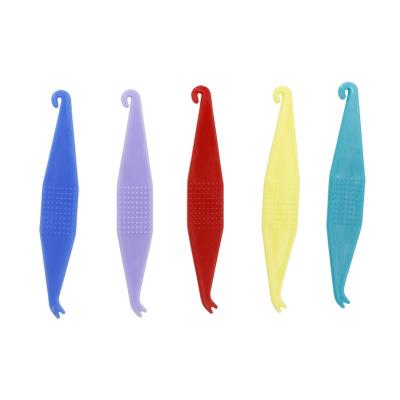 Cina SJ Multicolor Dental Disposable Plastic Orthodontic Rubber Bands Elastics Placers for Braces in vendita