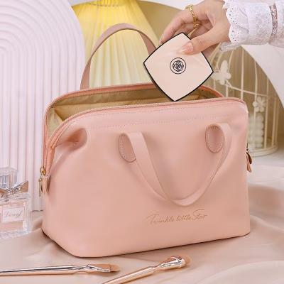 China Leak-Proof Drawstring Toiletry Bag PU Soft Handle Large Capacity Durable and Portable Cosmetic Organizer for Ladies for sale