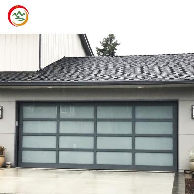 China Modern Frosted Glass Garage Door Anti-Theft Features New Black Aluminum Alloy Section Panel Automatic Open Style Home Use Motor for sale