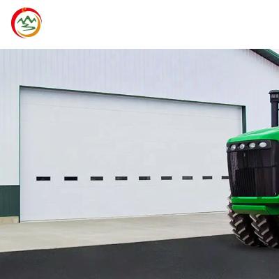 China Logistics Warehouse Transparent Window Sectional Industrial Vertical Lift Overhead Steel Workshop Door for sale