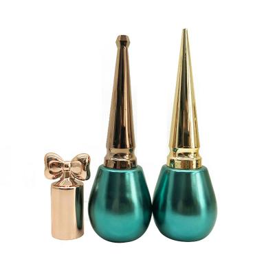 China Hanya Small Green Nail Polish Bottles With Long Golden Cone Cap for sale