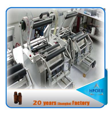 China Semi automatic self adhesive sticker vial labeling machine hand en venta