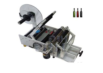 China Used round bottles hand labeling machine stick semi automatic en venta