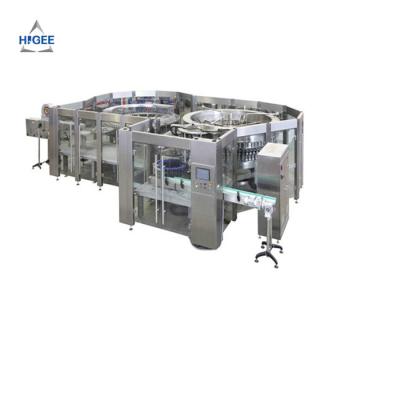 Chine bouteille des prix de machine d'embouteillage de l'eau rinçant le remplisseur remplissant et de capsulage de liquide de machine de remplissage de Zhangjiagang de machine à vendre