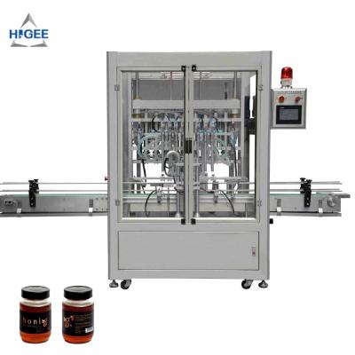 China Füllende mit einer Kappe bedeckende Maschinenlinie des kleinen Flaschenabfüllmaschinehonigglasglases des Honigs 2000BPH zu verkaufen