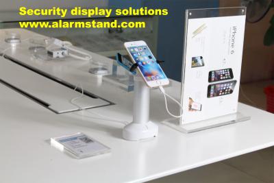 China COMER alarmante de aleación independiente de soporte magnético agarre de pantalla de seguridad soporte cuna de mesa para teléfono inteligente en venta