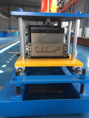 China 20 stages shutter door roll forming machine 12m / min 0.5 - 1.2mm thickness for sale