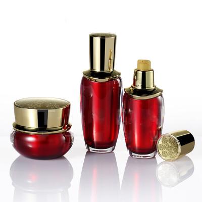 中国 50ml 100mlの赤い楕円形のローション ポンプびんのスキンケアのためのプラスチック アクリルの化粧品の血清のびん 販売のため