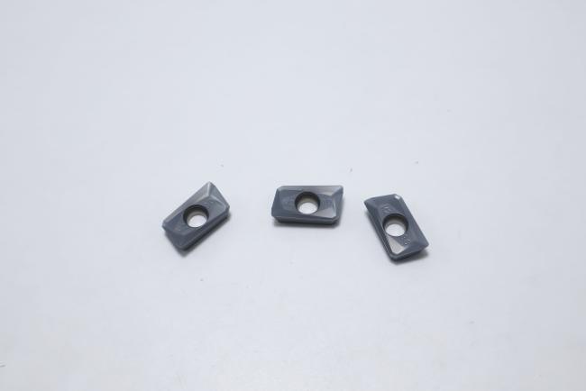 Close-up view of Carbide Milling Inserts showing detailed cutting edges