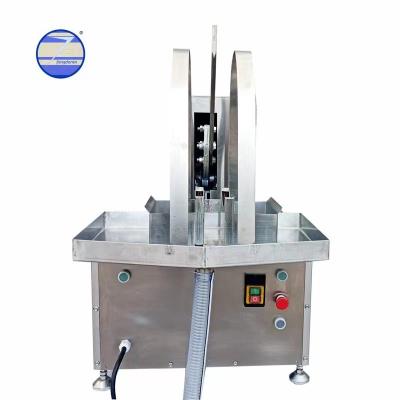 China Green coconut cutting machine coconut splitting half machine coconut cutting water intake machine for sale