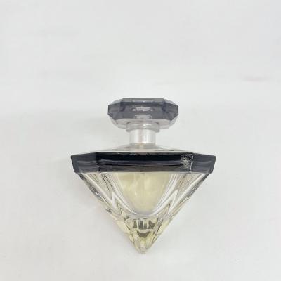 China Diamond Shaped Perfume Bottle 75ml 100ml Glass Bottle Press Spray Empty Bottle With zamak caps Cosmetics Packaging for sale