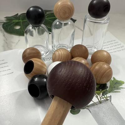 China Natural Solid Wood Ball type Perfume Bottle Cap for sale