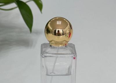 Cina Capo per profumi in metallo a forma circolare in lega di zinco Zamak Capo bottiglie di profumi in vetro in vendita