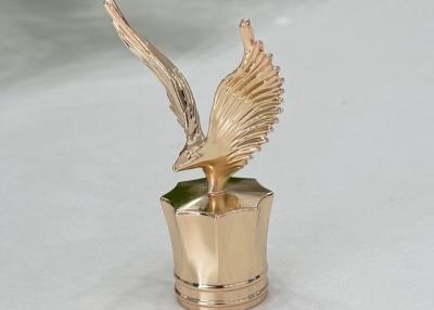 China Exquisite Eagle-Shaped Zamak Perfume Caps Perfume Bottle Lids In Gold Silver for sale