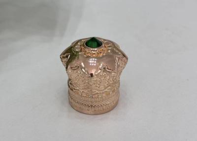 China Zinc Alloy Green Diamond Zamak Perfume Caps Perfume Lid With Customized Logo for sale