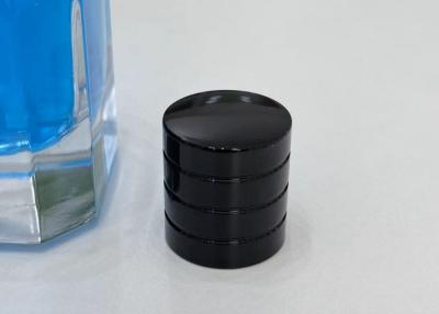 Chine Couvercles de bouteilles de parfums noirs premium en alliage de zinc pour emballages durables à vendre