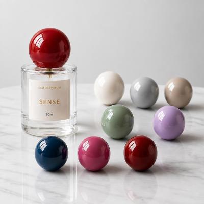 China Morandi Color Spherical Ball Perfume Cap Multi-Color Plastic Fragrance Bottle Lid Custom Logo Fits 15mm FEA Neck for sale