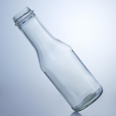 China Garrafa de vidro de pedra clara para suco de leite salada molho de pimenta ketchup 300 ml 500 ml 700 ml à venda