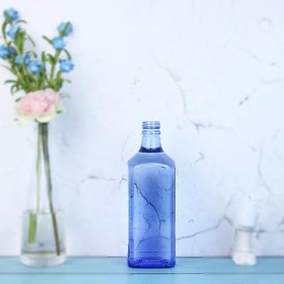 China Acid Etch Custom Design Quadrado 750ml Garrafas de vidro de cor azul para Vodka Whisky Unique à venda