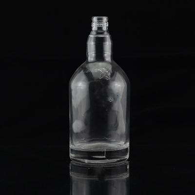 Cina Acid Etch Surface Handling Bottiglie di tequila di vetro con collo rotondo e filtro vuoto in vendita