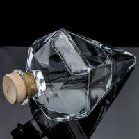 China Customized Logo Engraving Transparent Unique Design Shape Gin Glass Bottle With Cork for sale