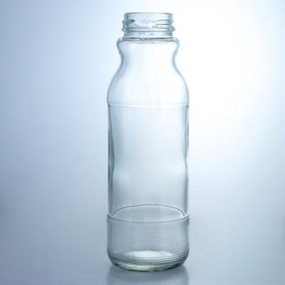 Cina Logo personalizzato Bottiglia di latte trasparente 320ml 500ml Bottiglia di caffè di succo di vetro con coperchio a vite in vendita