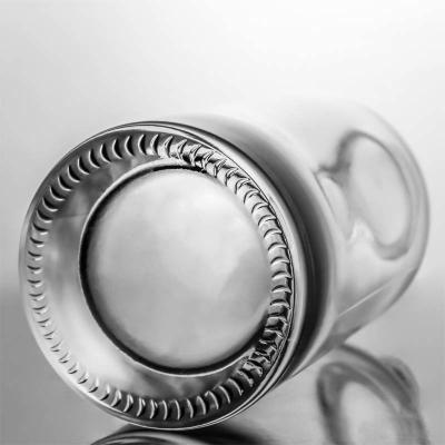 China Garrafa de vidro de pedra de forma redonda de 500 ml, 700 ml e 1000 ml, com rolha para outras bebidas à venda