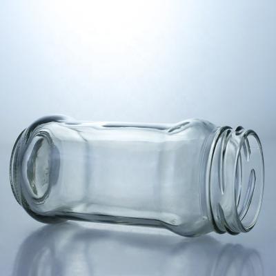 Cina Bottone di contenimento di marmellata di miele in vetro trasparente con coperchio a sigillo metallico da 25 ml a 1000 ml in vendita